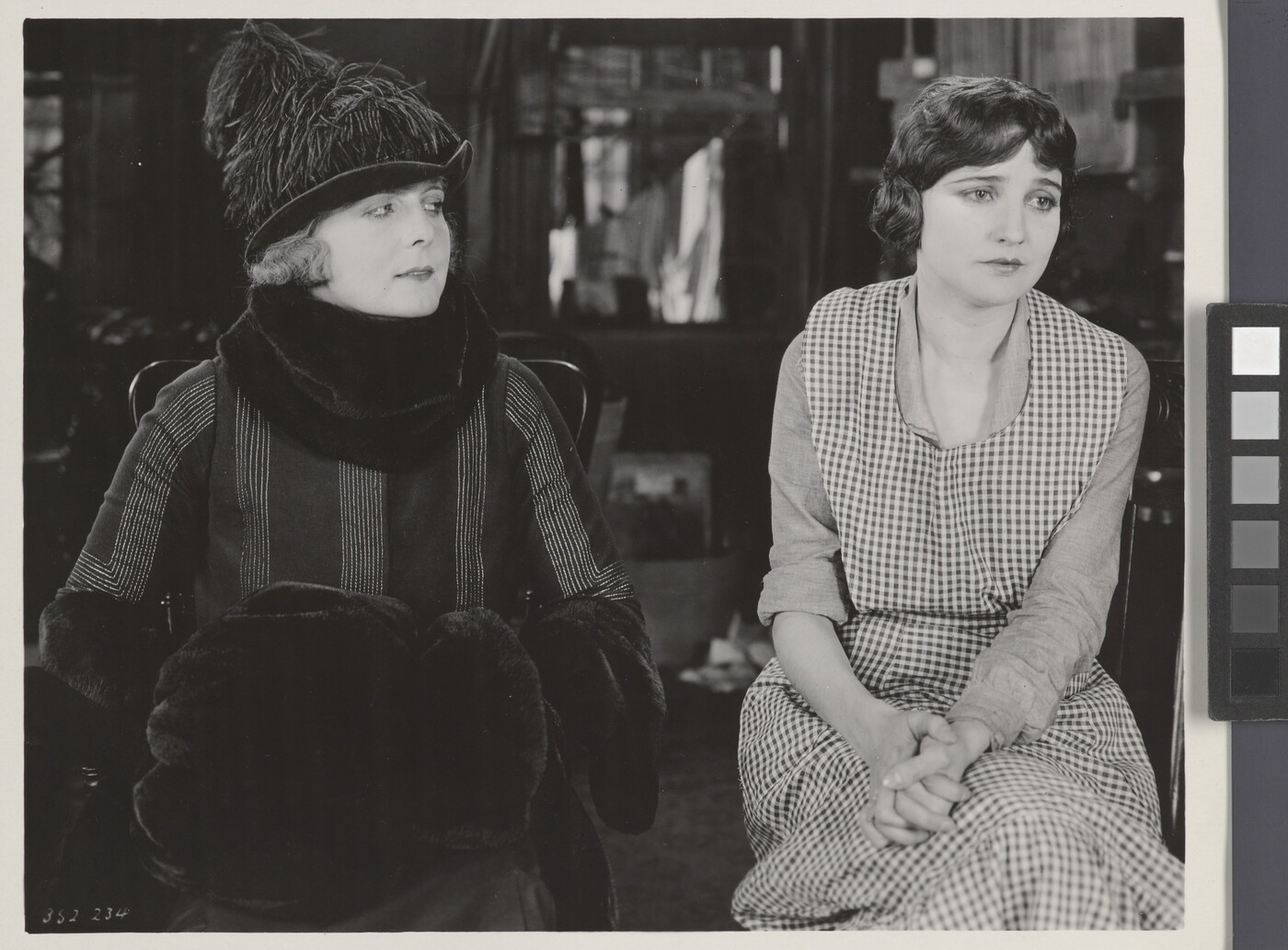 [Agnes Ayres in apron, sitting with Kathlyn Williams in formal coat and ...