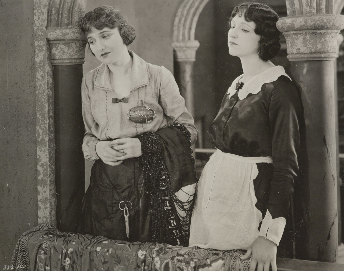 [Agnes Ayres and maid looking through archway, "Forbidden Fruit ...