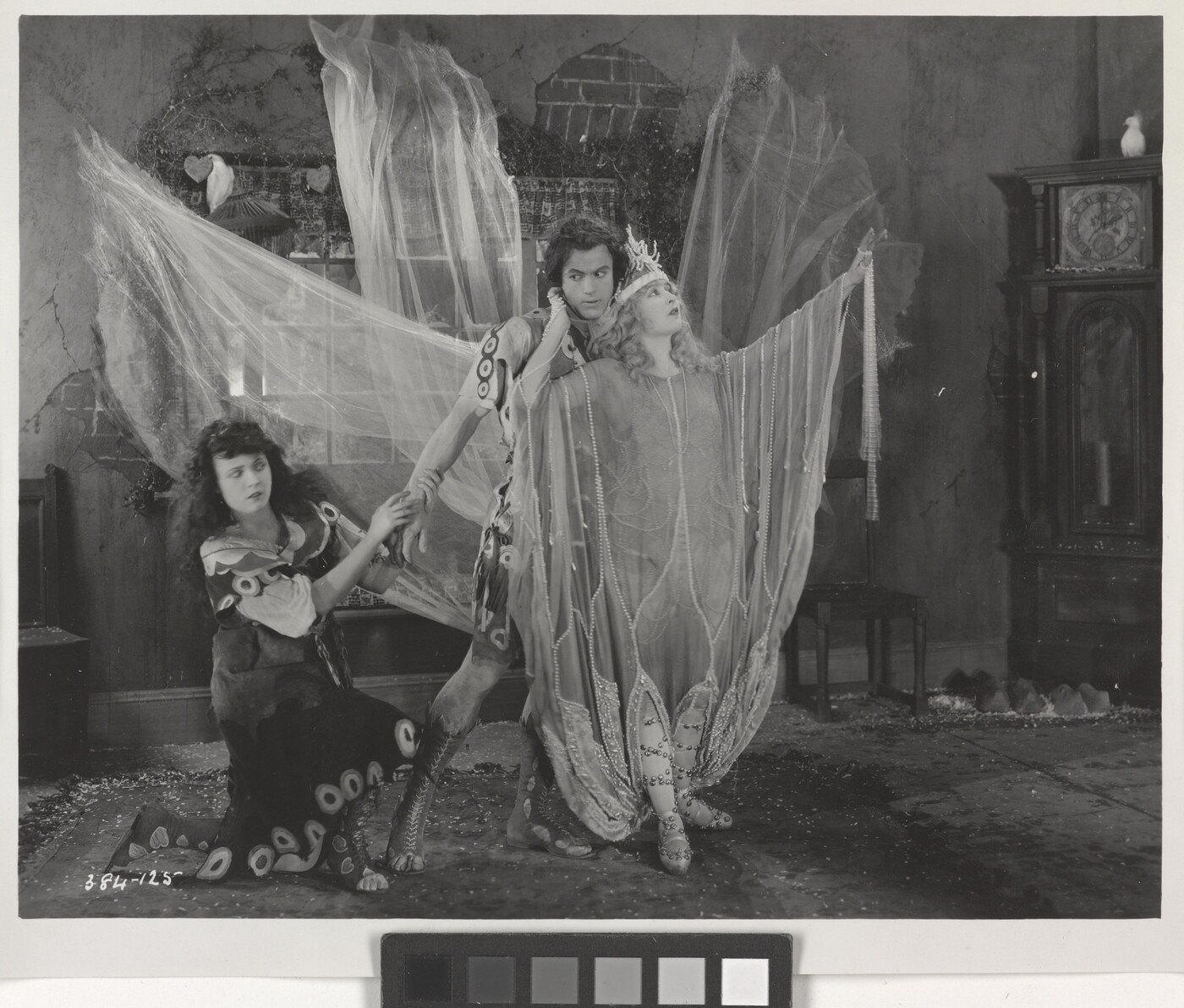 [Mildred Harris posed with Jacqueline Logan and actor in play, "Fool's ...