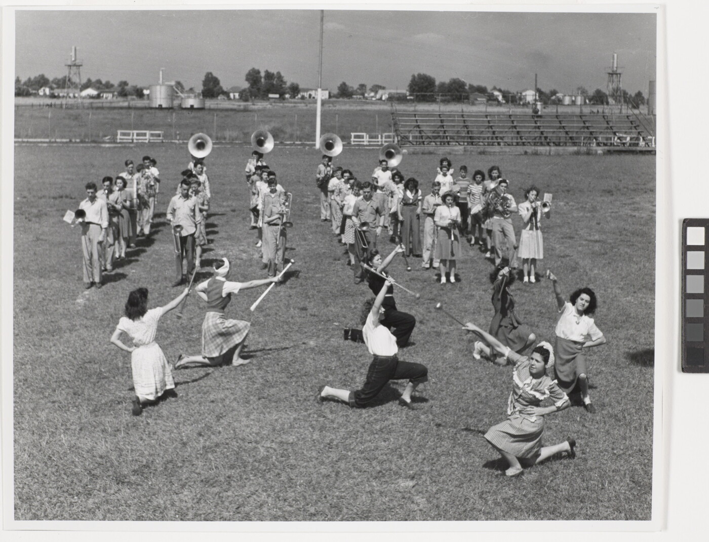High School. Band and Baton Twirlers Practicing on the Football Field ...