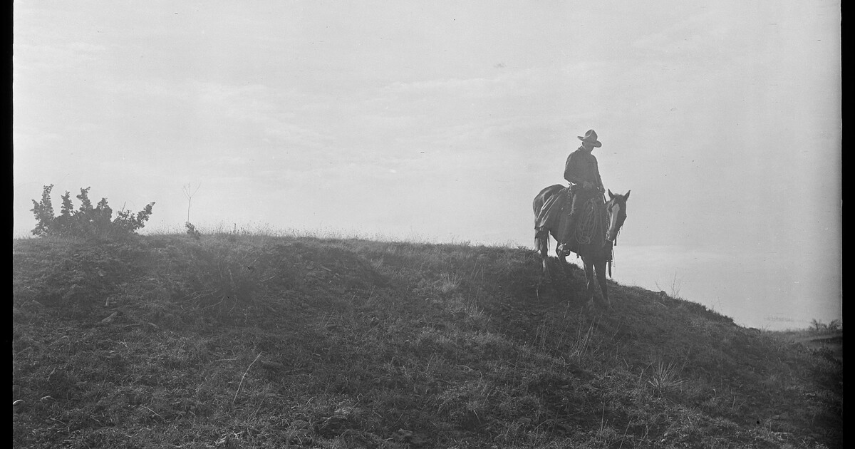 Edwin Sanders, cousin of the photographer, Erwin E. Smith, descending a ...