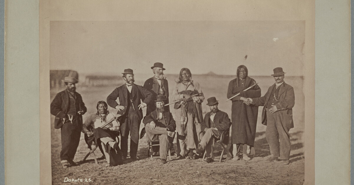 [Group of nine: unidentified man, Packs Hios Drum, John Finn, Amos ...