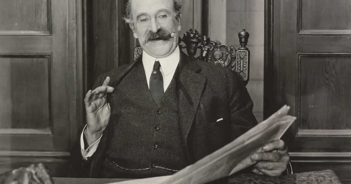 [Theodore Roberts reading newspaper and smoking cigar, "Saturday Night ...