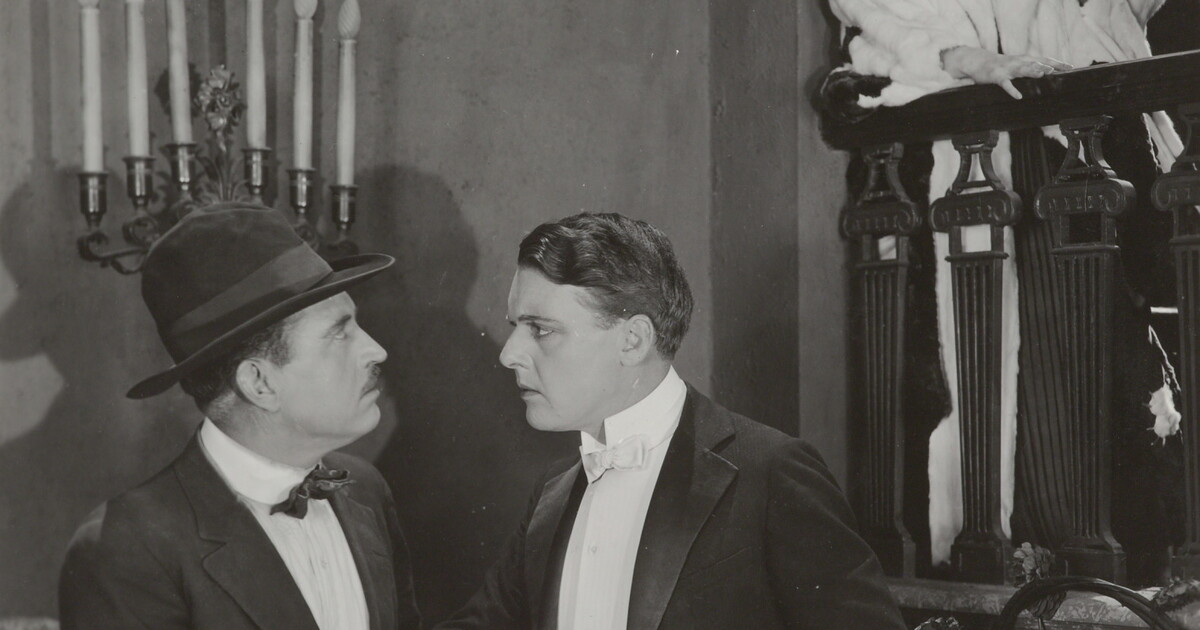 [Forrest Stanley approaching Clarence Burton with pistol, Agnes Ayres ...