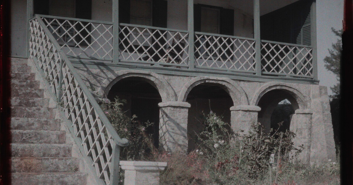 [Bermuda - raised house with arches and lattice work porch railings ...