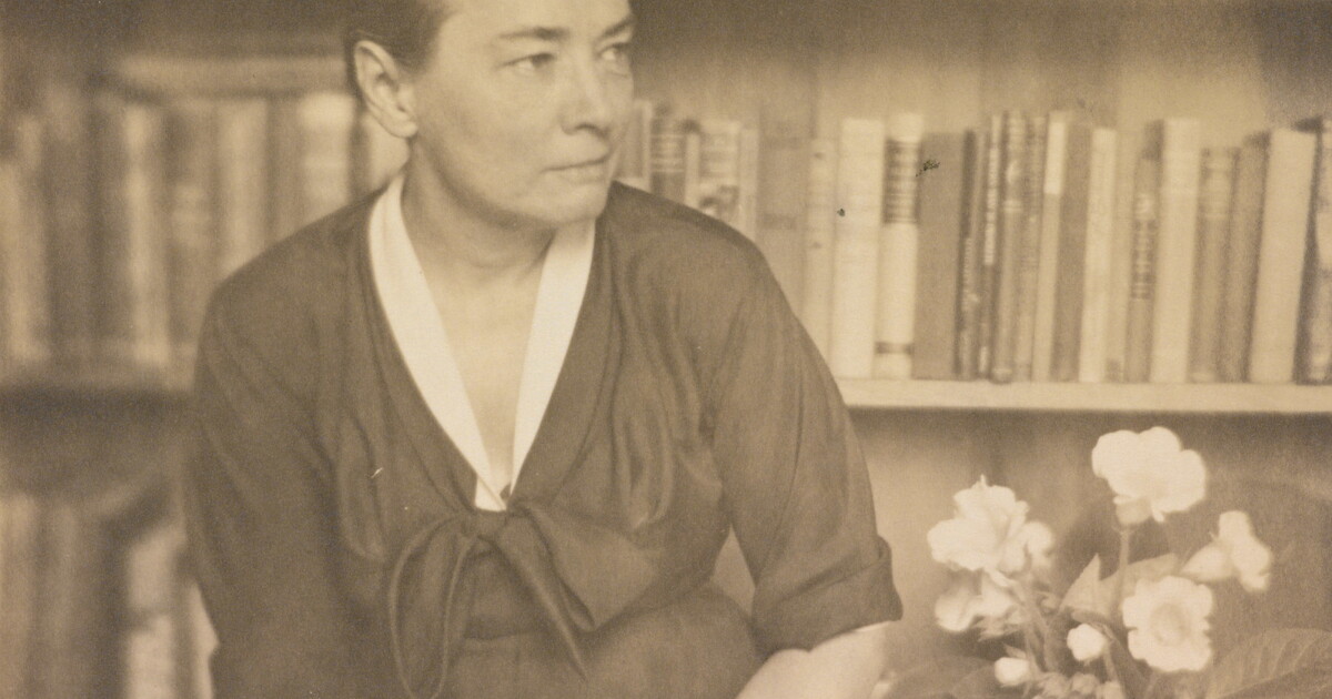 [Phyllis Fenner seated on desk with a book] | Amon Carter Museum of ...