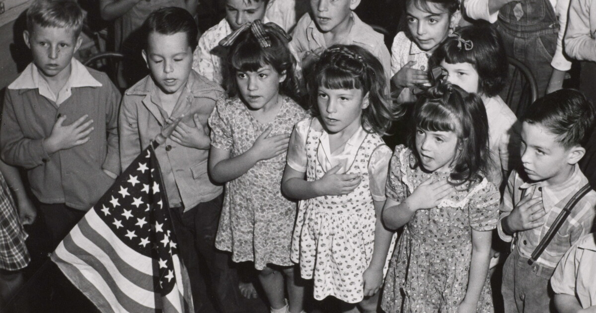 Elementary School. First Grade Students Start the Day by Reciting the ...