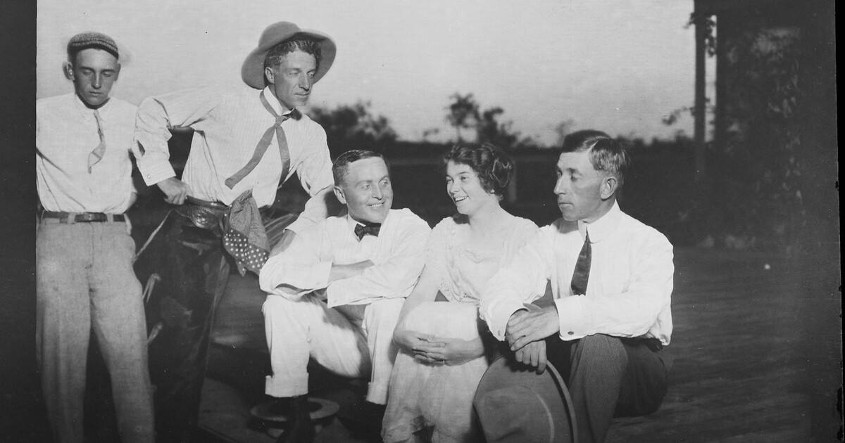 [Group portrait including George Pattullo and Will Lewis, both seated ...